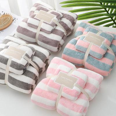 Cina Set di asciugamani per mani e viso a strisce larghe di velluto corallino 35*75cm 70*140cm Set di asciugamani assorbiti in microfibra in vendita