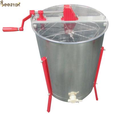 China Metal Stands SS Honey Extractor Manual Honey Processing Machine 4 Frames for sale