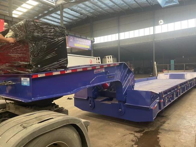 Detailed view of suspension system on 3-Axle Low-Bed Trailer