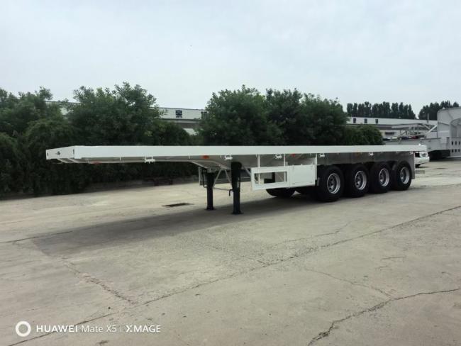 Factory Price Deck 4 Axle Container Flatbed Semi Trailer Shipping Transport for Sale