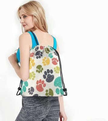 中国 Digital Printed Drawstring Backpack Bag Hand Drawn Doodle Prints Puppy Footprint Drawing 販売のため