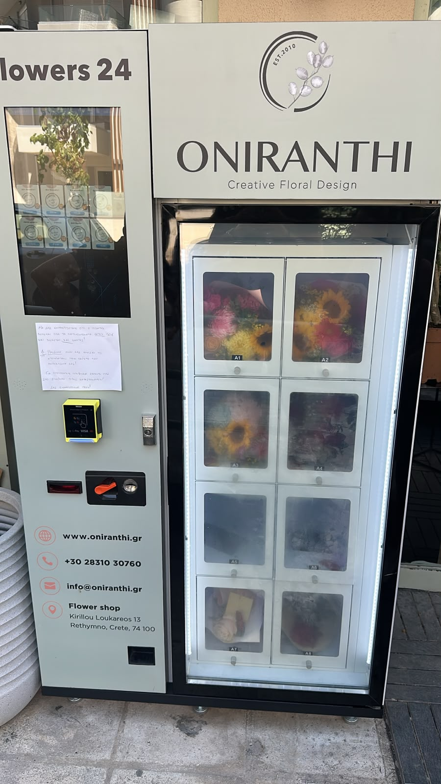 Flower vending machine locker selling fresh flower bouquets in Greece