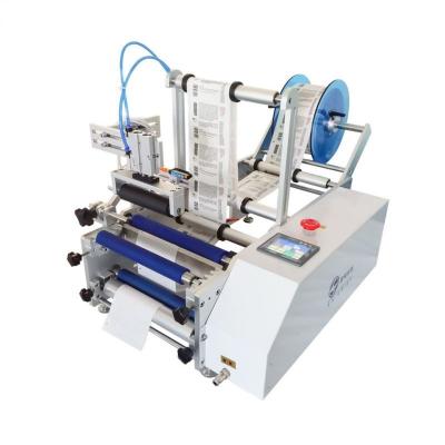 China Máquina de etiquetado semi auto de la botella redonda para la botella de vino/la botella farmacéutica en venta