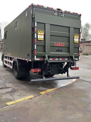 Cina Doppio ascensore a mensola 1500Kg che carica il carico con la piattaforma d'acciaio dell'ascensore della porta posteriore di 24V 3KW in vendita