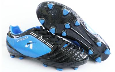 Cina Il calcio all'aperto nero/blu rinforza le scarpe con una bietta di calcio per i ragazzi/ragazze in vendita