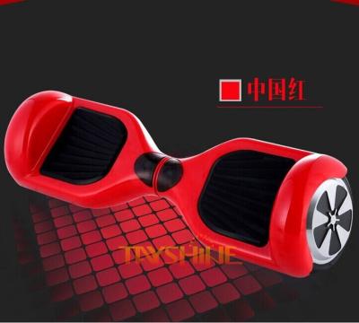 中国 6.5 インチのタイヤが付いている赤い小型スマートな電気スクーターの漂う板 販売のため