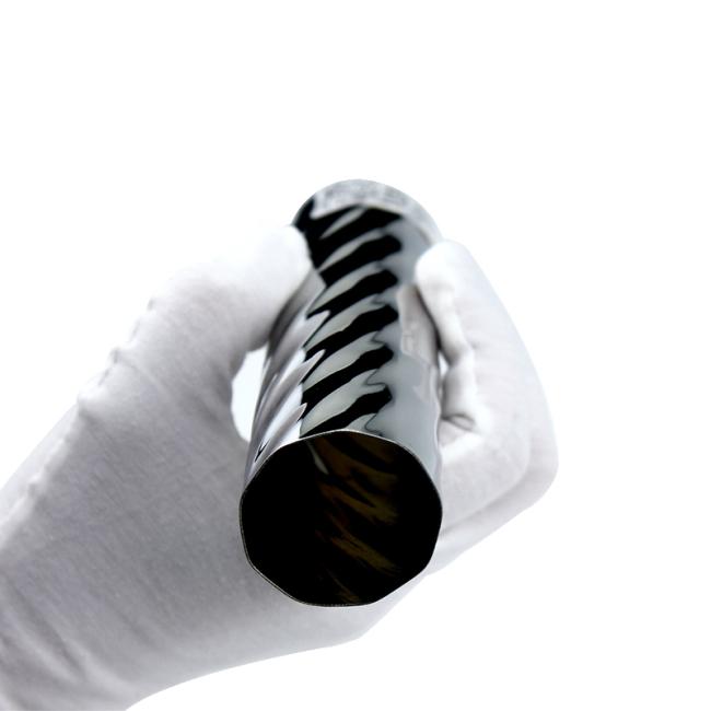 Twisted Decorative Embossed Stainless Pipe Gloved hand holding twisted embossed stainless decorative pipe