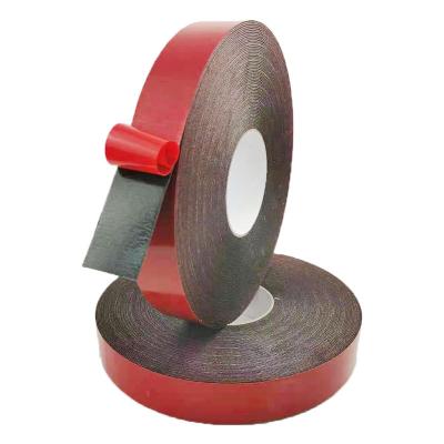 Cina Nastro biadesivo in schiuma nera con film rosso spesso 1 mm Nastro biadesivo in schiuma per auto Nastro biadesivo in PE in vendita