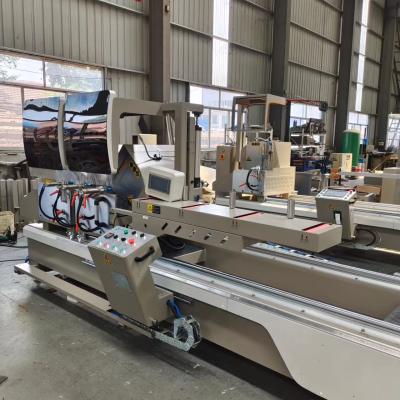 Chine la fenêtre en aluminium et la porte de 4000mm faisant à machine la double coupe principale automatique ont vu à vendre