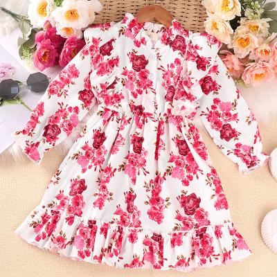 中国 ばねの子供の衣類の女の子のDress子供のための新しい花の長い袖の王女 販売のため