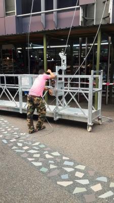 China Manufacturer100% copper gearing Steel structure 415v curtain wall cleaning / maintenance suspended work platform for sale