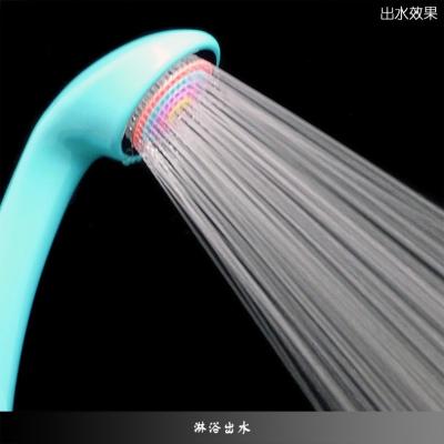 中国 多彩なABS子供のためのプラスチック円形の手持ち型のシャワー・ヘッドの小さい美しい 販売のため