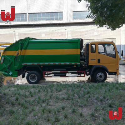 Cina Camion di immondizia di bassa potenza del compattatore del caricatore della parte posteriore della gestione dei rifiuti 8CBM in vendita