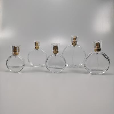 Cina 25ml 30ml 50ml 100ml bottiglia di profumo di vetro con spray atomizer in vendita