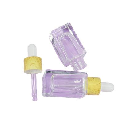 Cina Stampa serigrafica 10ml 15ml Imballaggio in vetro Bottiglia a forma quadrata per olio essenziale per capelli in vendita