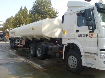 Cina HOWO A7 CON IL TRASPORTATORE DIESEL dell'AUTOCISTERNA TRUCK/GUEL dell'OLIO dell'AEROPLANO del RIMORCHIO dell'AUTOCISTERNA dell'OLIO COMBUSTIBILE di LITRO 42M3/42000 in vendita