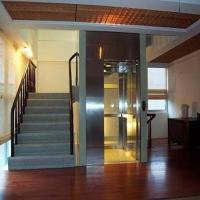 Quality 500-5000 Kg Capacity Screw Drive Elevator with Emergency Stop Protection and Low Maintenance for sale