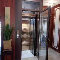 Quality 304 Stainless Steel Cabin Hydraulic Elevator with 3m Overhead Clearance and 14.5m Max Height for sale