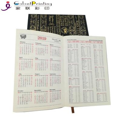 Cina Hardcover Weekly Monthly Diary Custom Planner Printing High Gloss UV Varnish in vendita