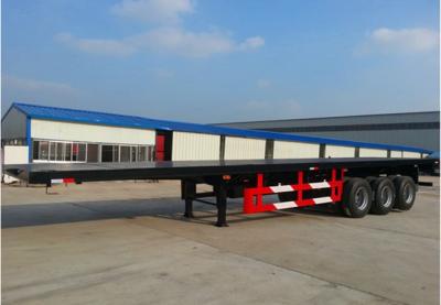 Cina Il 40 piedi e 12 spinge 50 il rimorchio a base piatta dell'asse del contenitore 3 di tonnellata resistente in vendita