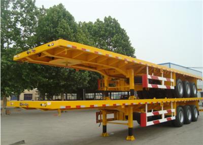 中国 12.5m のステンレス鋼 ratches 南アメリカが付いている 3 台の車軸平面容器のトレーラー 販売のため