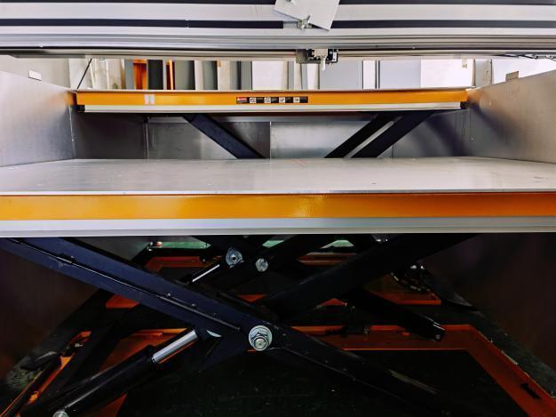 Close-up of door mechanism on Glue Plotter
