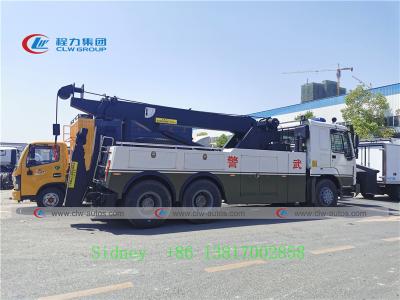 Κίνα βαρέων καθηκόντων Wrecker φορτηγό 6X4 Sinotruk Howo με το φτυάρι Antiroit προς πώληση