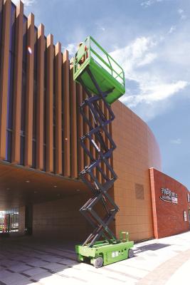 Cina Motore idraulico che determina altezza di lavoro automotrice della piattaforma 12m dell'ascensore di forbici in vendita