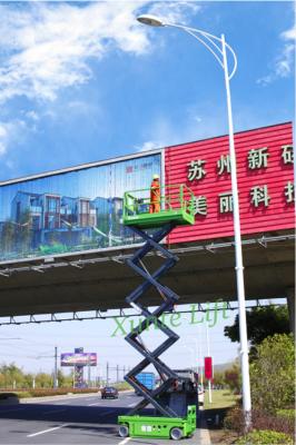 China Automotores eléctricos de la venta de la fábrica Scissor capacidad de cargamento de la altura 320kg de la plataforma de los 10m de la tabla de elevación en venta