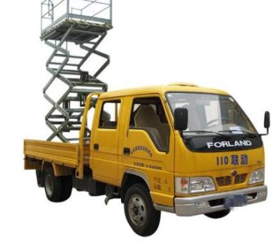 Chine ascenseur de ciseaux monté par camion de capacité de chargement 450kg de 12m avec le système de abaissement auxiliaire à vendre