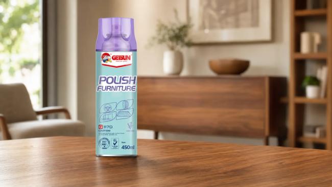 GETSUN furniture polish spray bottle on a wooden surface