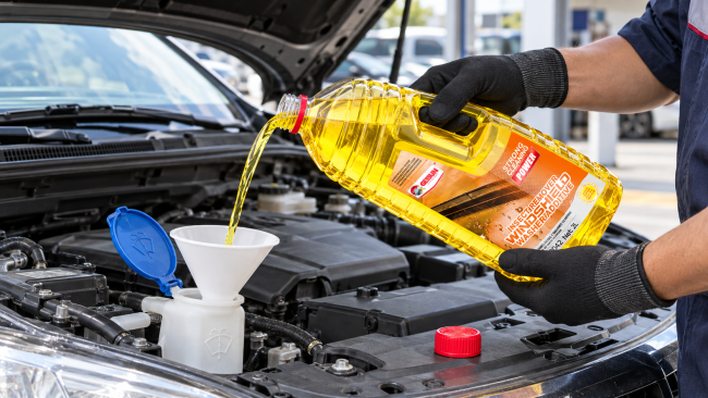 GETSUN GT-8042 poured undiluted through a funnel into a vehicle windshield washer reservoir