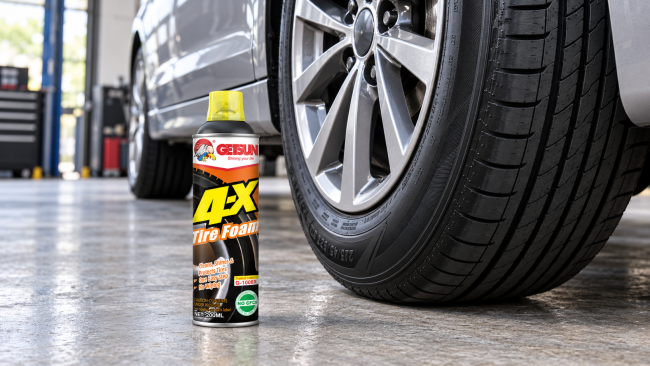 GETSUN 4-X 200ml tire foam can beside a clean passenger car tire