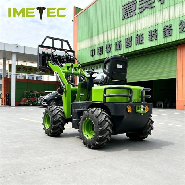 Electric forklift showing quick-attach system and compact design