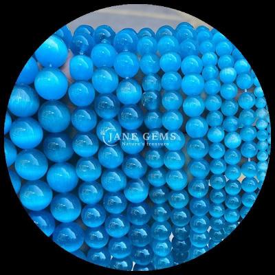 중국 Red Blue Purple Colorful Bead Round Shape Cat Eye Loose Bead Strands for Healing Energy and Gift Giving 판매용