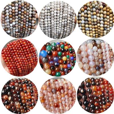 China Perlas de ágata multicolores personalizadas en forma redonda de 8 mm para la fabricación de joyas en venta