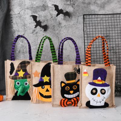 China In-stock New Halloween Gift Non-woven Tote Bag Candy Pumpkin Bag Decoration Prop Gift Bag for sale
