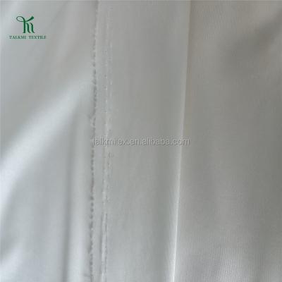 China High Quality 115-120gsm White Knitted Fabric Elastic Polyester Greige Fabric Popular Export for Vest Camisole Woven Plain for sale