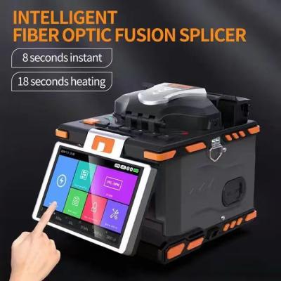 Cina M5 Splicer di fusione di fibre 4 allineamento del nucleo motore Mini macchina di saldatura in fibra ottica per Ftth in vendita