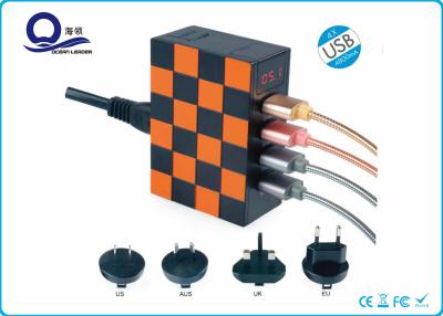 Cina Caricatore universale variopinto di viaggio di 4 porte USB con le spine BRITANNICHE intercambiabili dell'AU di UE Stati Uniti in vendita