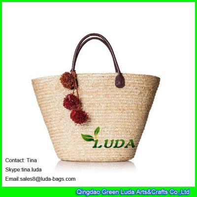 Cina LUDA italian leather handbags ladywoven purse on line pom pom straw totes in vendita