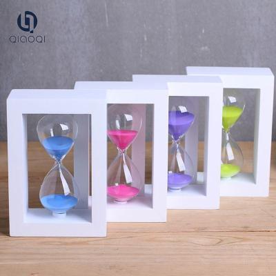 China Customize 3 mins colored hourglass timer with wooden frame can printing logo for sale