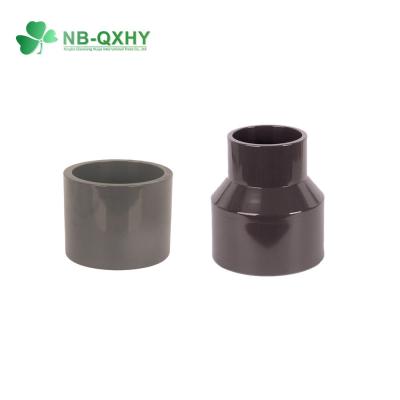 Cina DIN Pn16 Acqua di approvvigionamento di PVC Pipe Fitting Accoppiamento riducente con opzione di personalizzazione in vendita