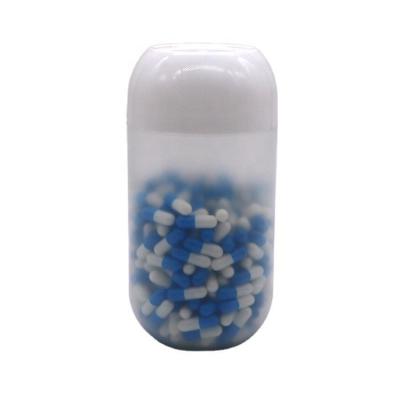 Cina Bottone di plastica per la conservazione degli alimenti a forma di capsula di 500 ml PP personalizzato con tappo a vite in vendita