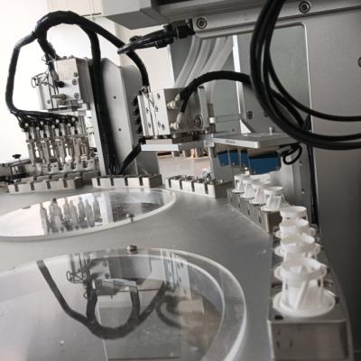 China High Speed Desiccant Cap Assembly Machine with High Qualified Rate and Separate Exits for Pharmaceutical and Health Care Applications for sale