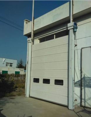 China Van de Bouw Industriële Sectionele Deuren van de staalsandwich de Rol Buiten24db Geluidsisolatie Te koop