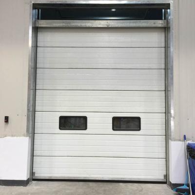 China De snel Verticale Opheffende Deuren die van de Staal Sectionele Garage Snelheid 0.8m/s sluiten Te koop