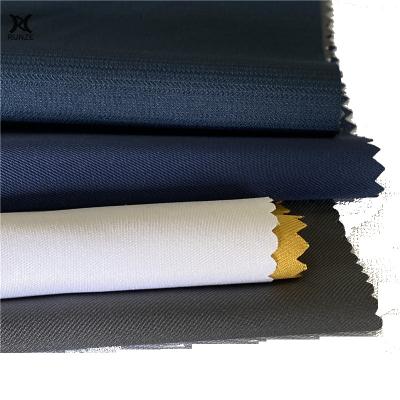 China Tecido de microfibra de poliéster suave e resistente à umidade para camisas e vestuário desportivo masculino à venda