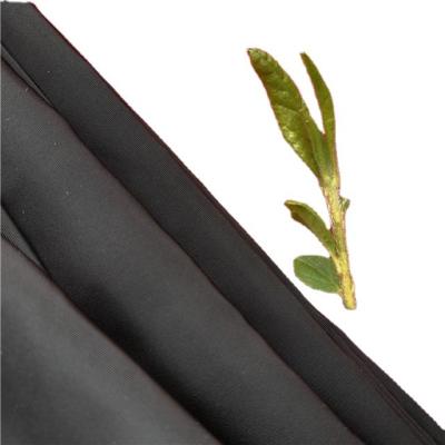 China Densidade personalizável Tecido de pele de pêssego 112GSM Poliéster de microfibra para calças de praia à venda