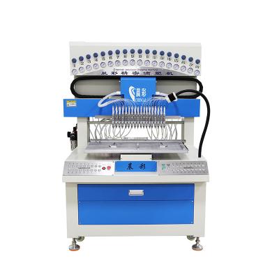 Chine XYZ précision 0,01 mm 18 couleurs Machine de goutte à goutte en caoutchouc PVC doux pour la fabrication d'étiquettes à vendre